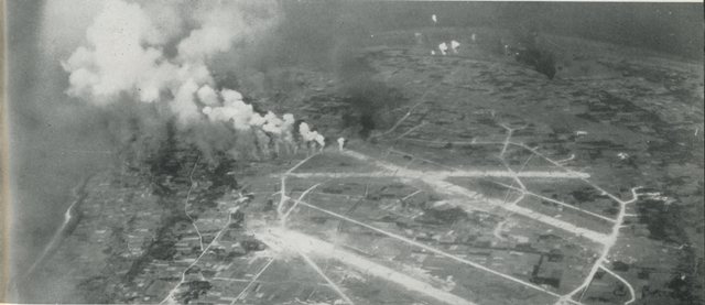 Japanese airfield under attack on the island of Ie Shima, a few miles ...
